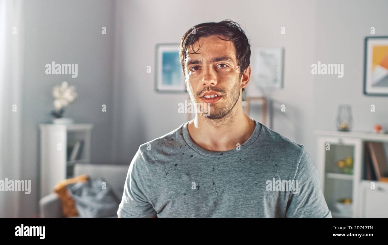 Sweating Muscular Athletic Fit Man in Grey Outfit is Posing After a ...