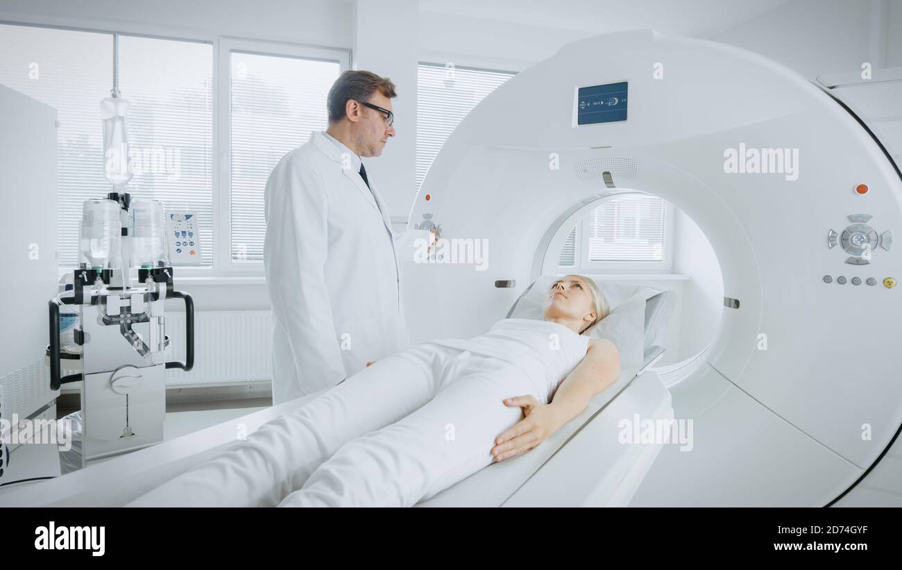 In Medical Laboratory Radiologist Controls MRI or CT or PET Scan with ...