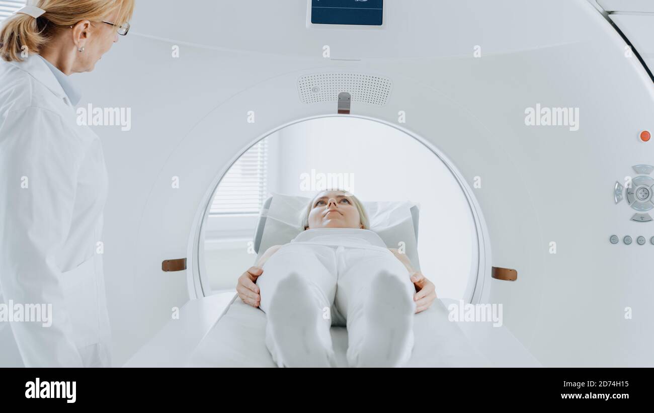 Close-up Portrait Shot of a Female Patient Lying on a CT or MRI Scan ...