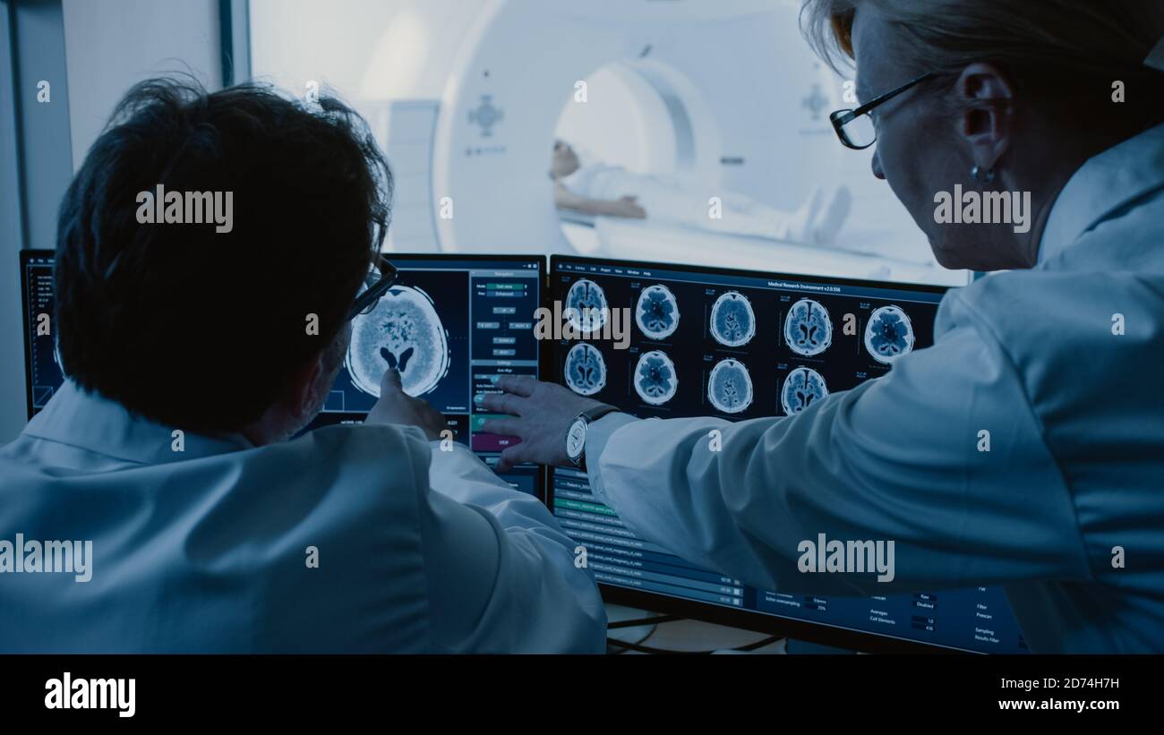 Doctor watching patient control room hi-res stock photography and ...