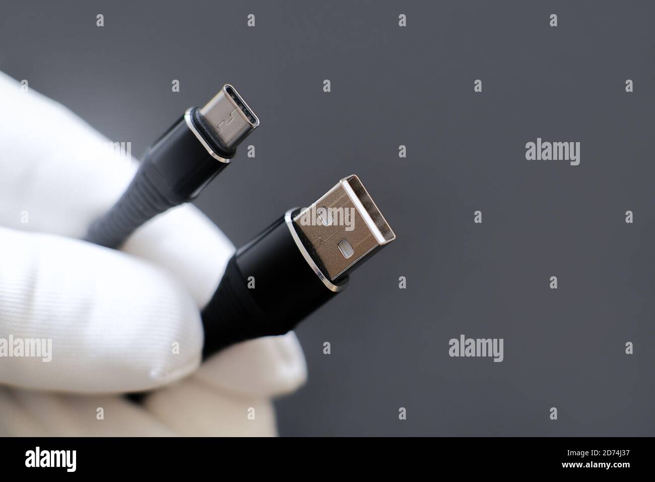 USB cable from USB to USB 3.1 type C. abstract gray background for ad ...