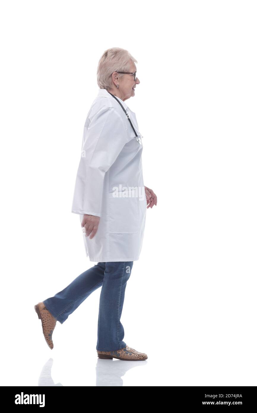 Senior doctor stethoscope walking Cut Out Stock Images & Pictures - Alamy