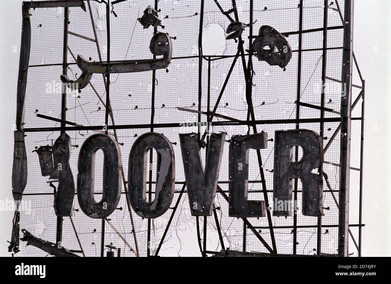 18th September 1993 A damaged neon advertising sign on top of a ...