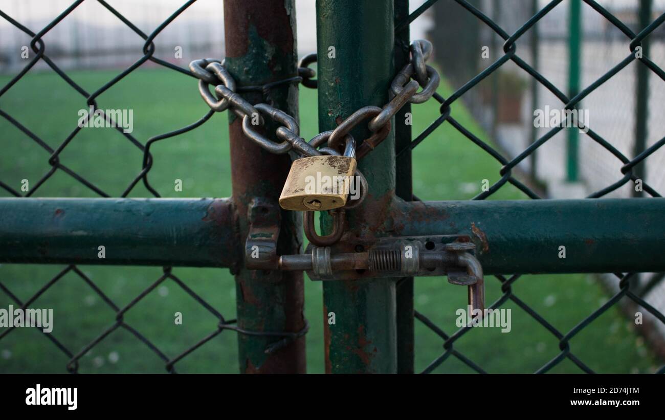 Door lock with chains on, security concept with lock, securing what's ...