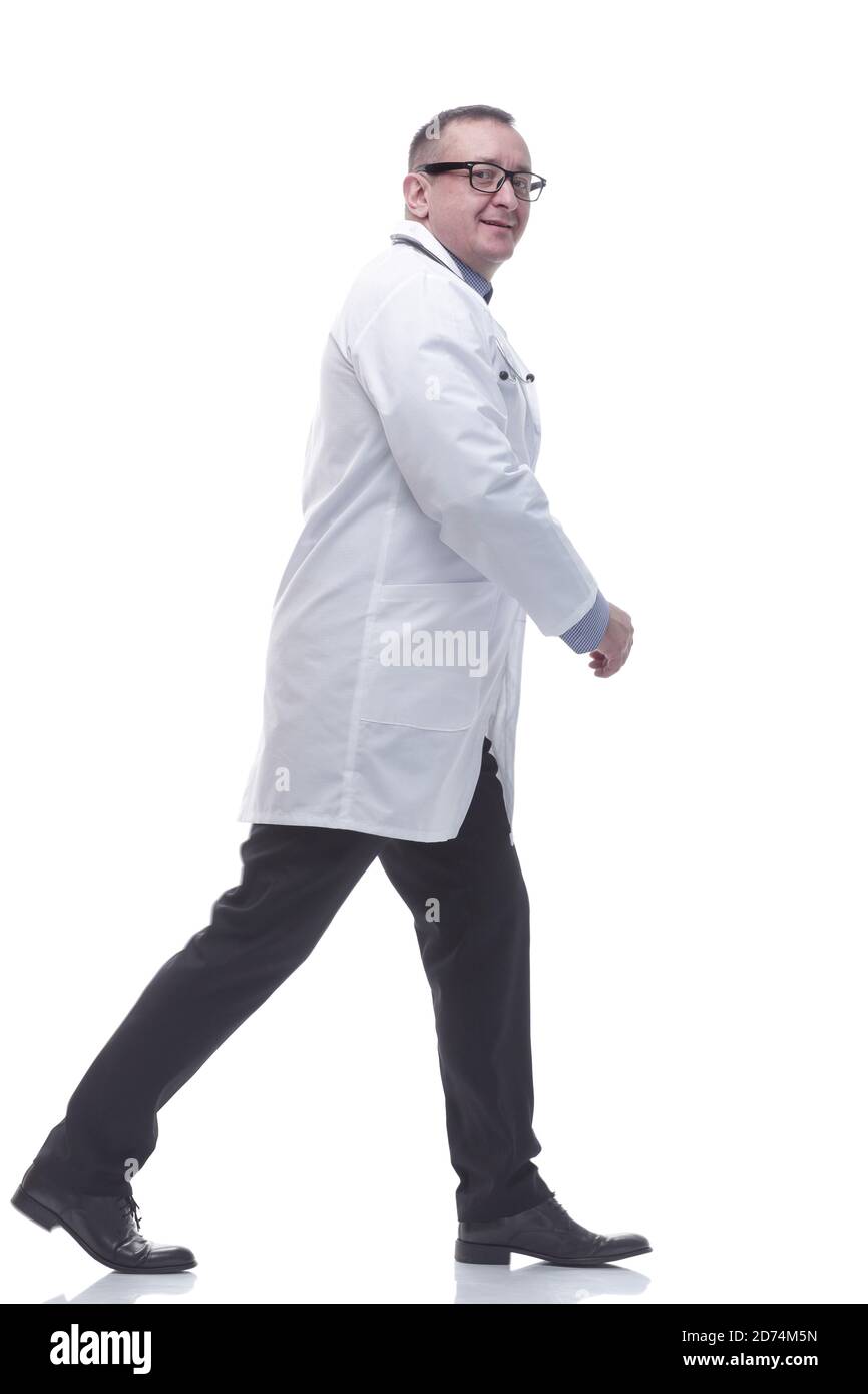 in full growth. confident male doctor striding forward Stock Photo - Alamy