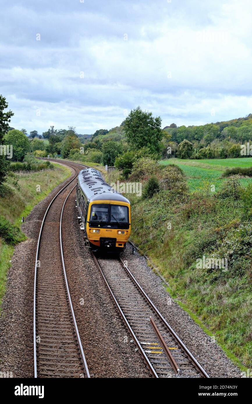A Great Western Train ,GWR, travelling along a rural line in the Surrey ...