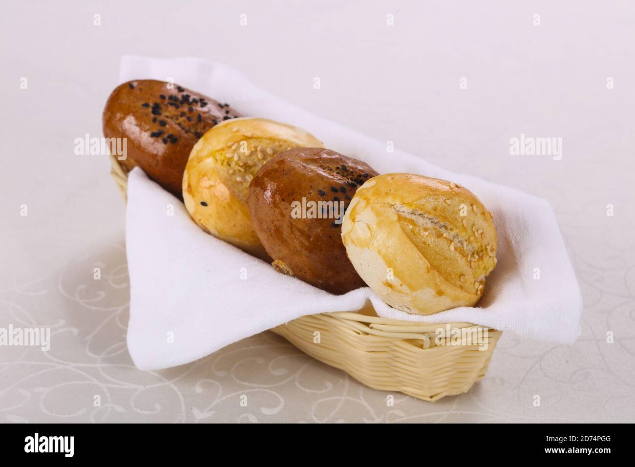 Bun assortment in the basket for dinner Stock Photo - Alamy