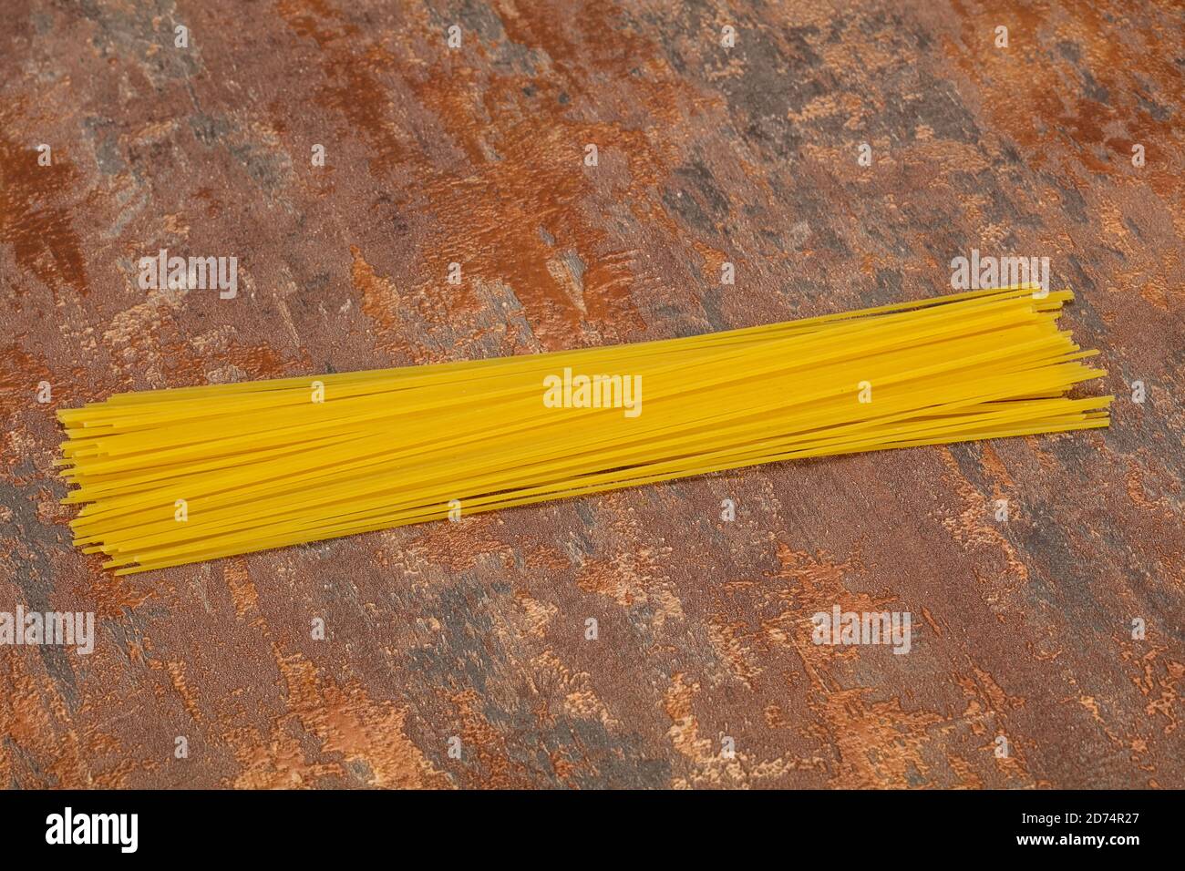 Dry raw spaghetti ready for bowling Stock Photo - Alamy