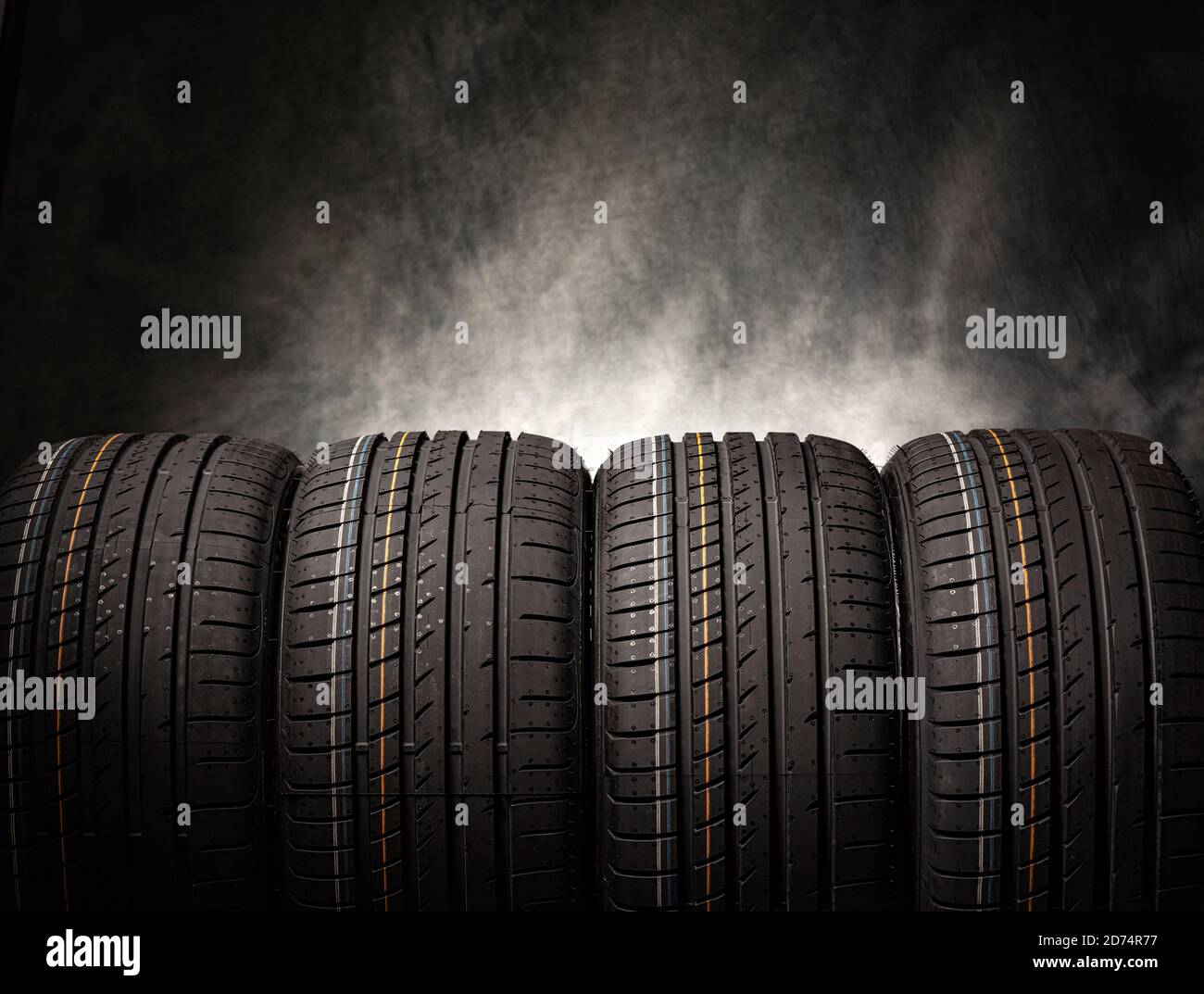 Tire stack background Stock Photo - Alamy