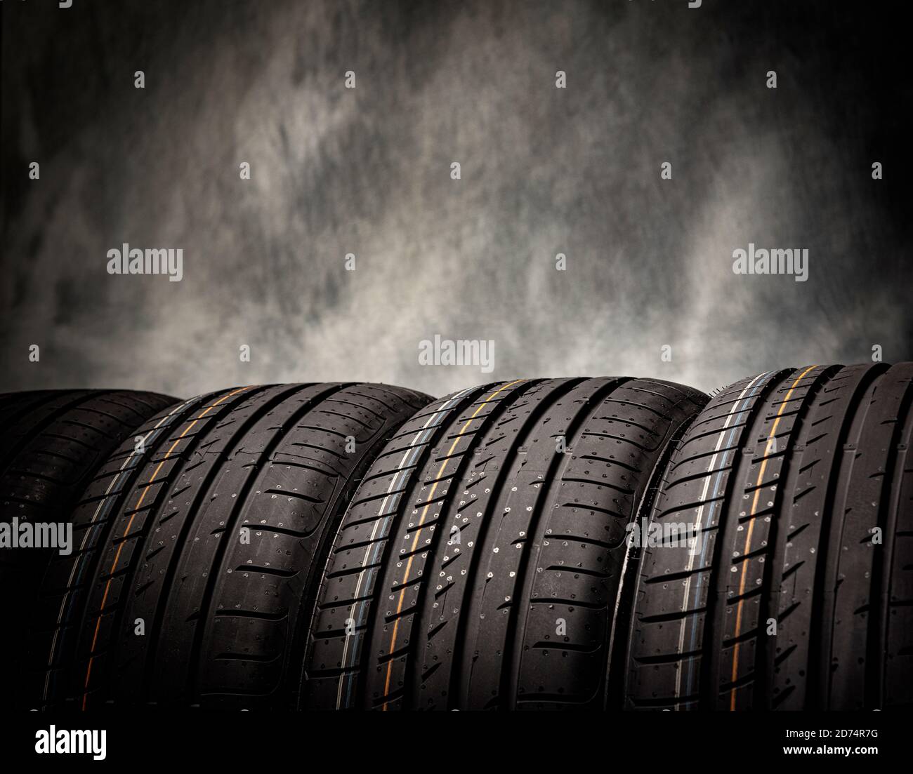 Tire stack background Stock Photo - Alamy