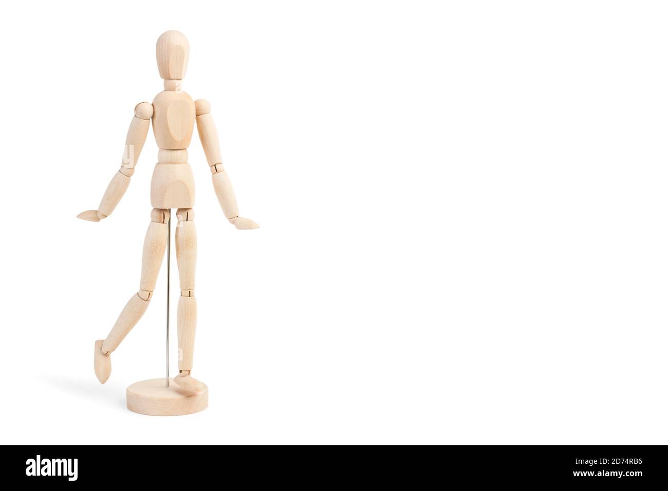 A wooden mannequin toy on a white background with copy space Stock ...