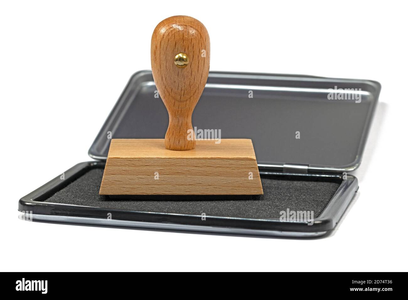 Wooden stamp on a stamp pad against a white background Stock Photo - Alamy