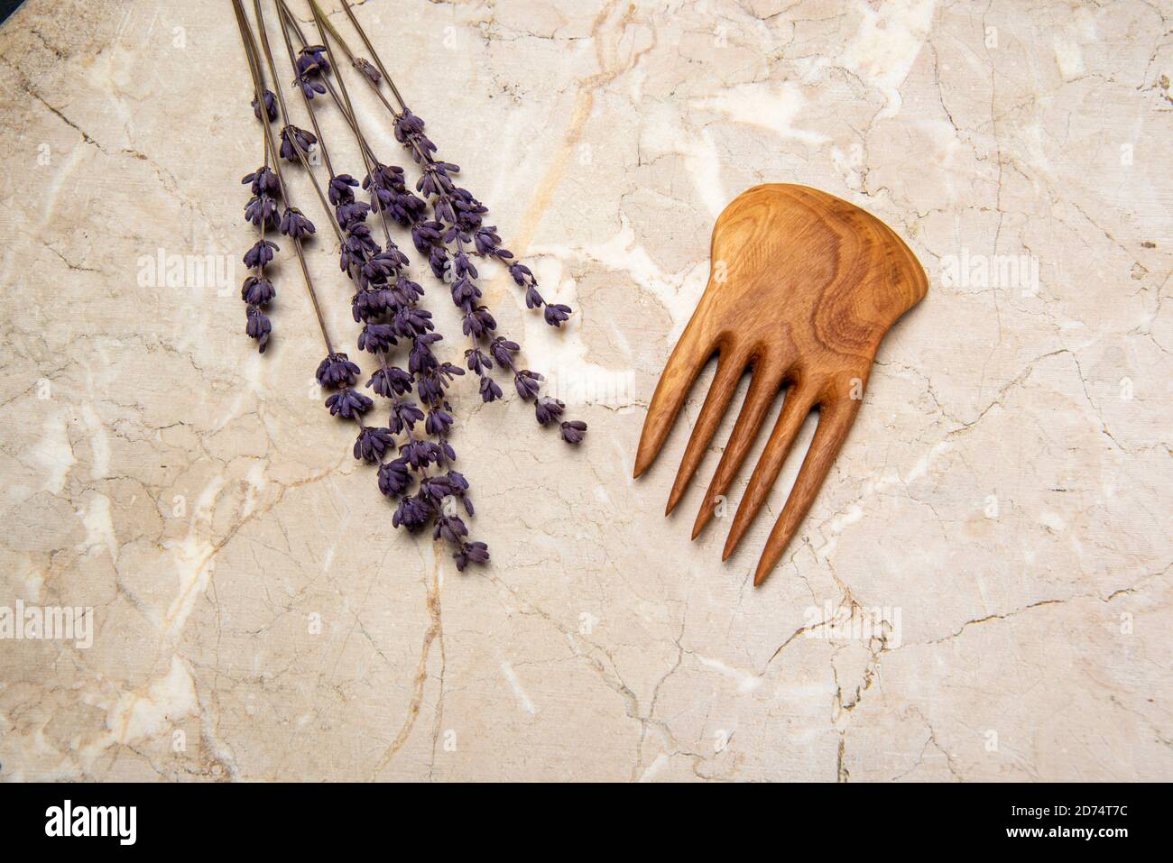 hand crafted wooden comb on marble Stock Photo - Alamy