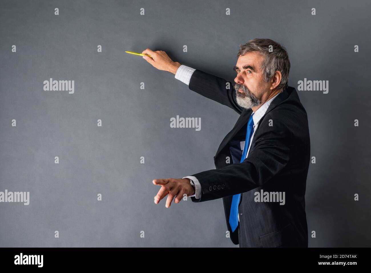 Teacher pointing board classroom hi-res stock photography and images ...