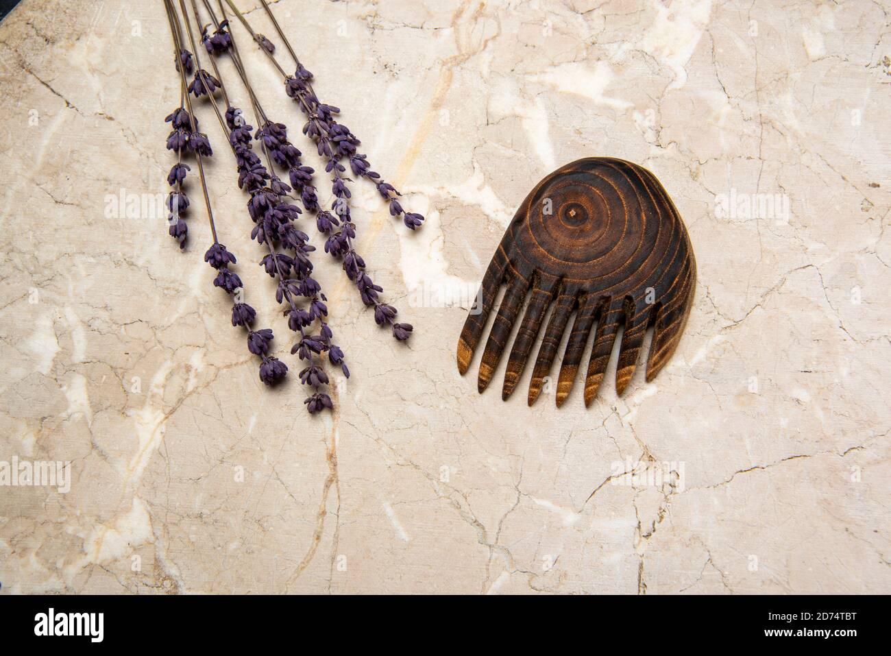 hand crafted wooden comb on marble Stock Photo - Alamy