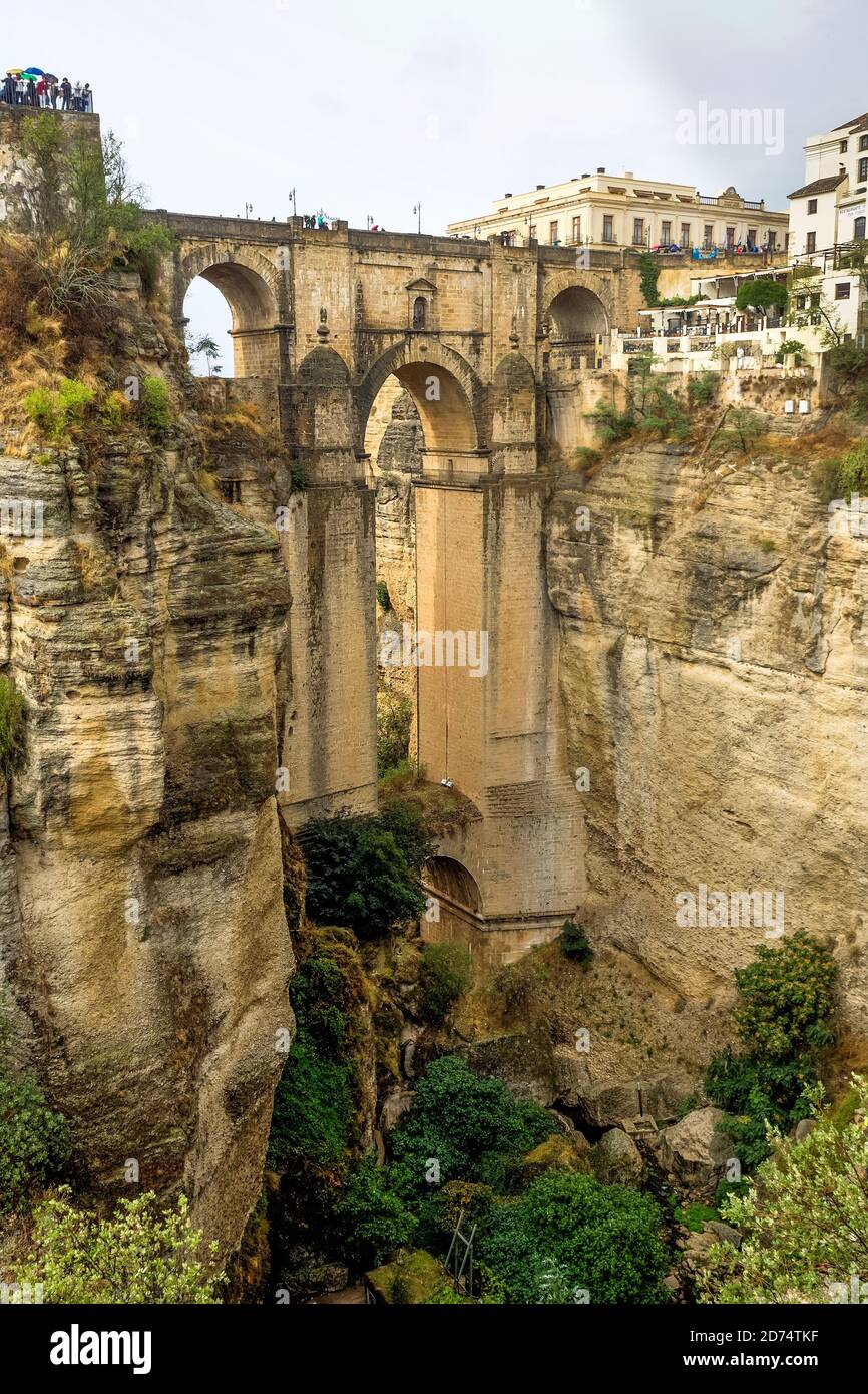 The Puente Nuevo, New bridge in Ronda, Spain spans the 120m deep chasm ...