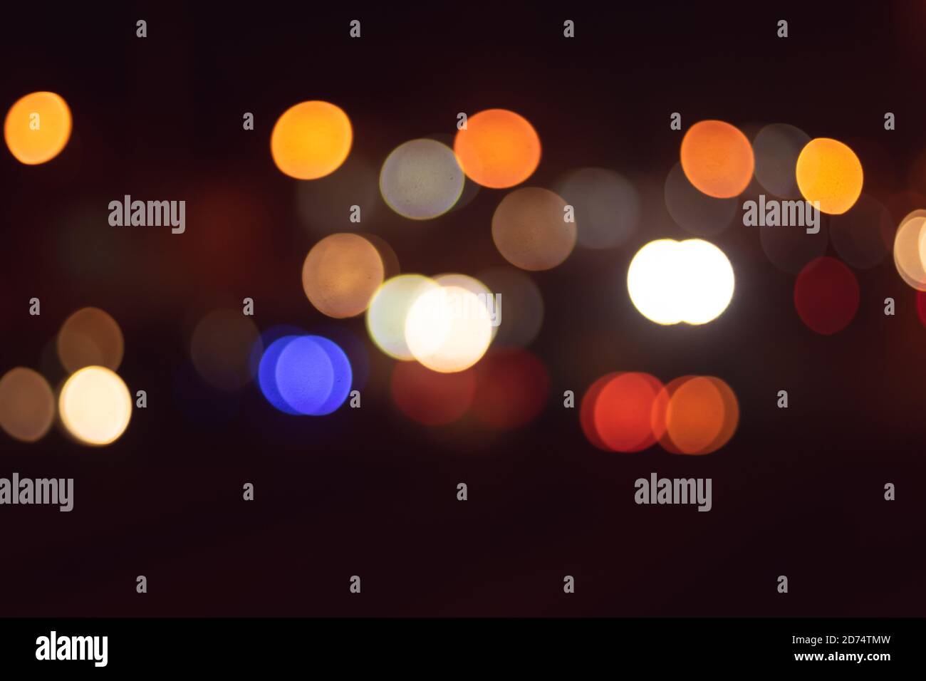 Bokeh background of unfocused colorful street lights at night Stock ...