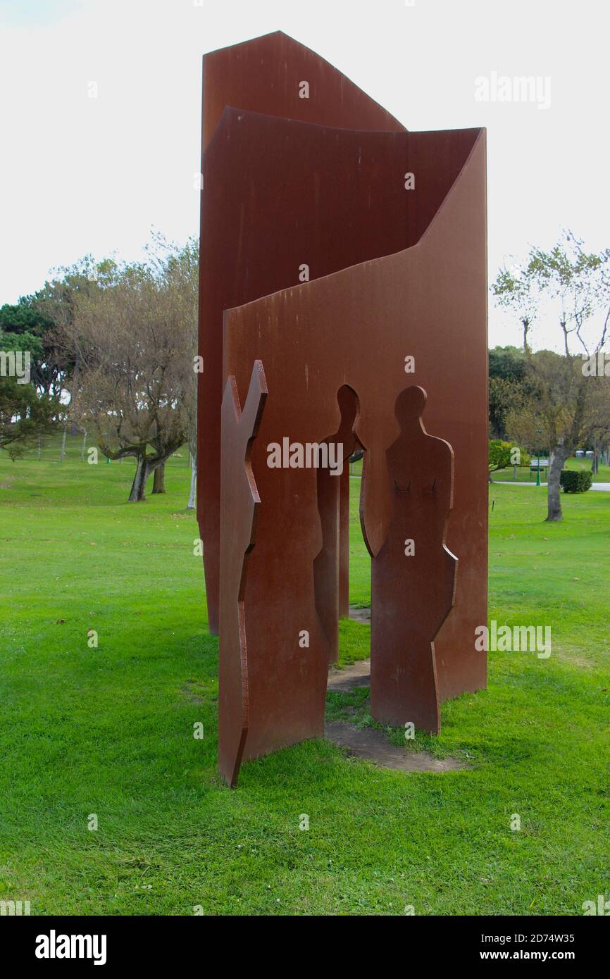 Modern rusting iron sculpture dedicated to the victims of terrorism in ...