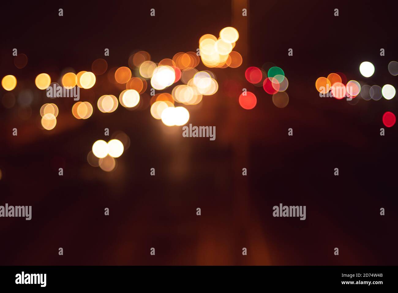 Bokeh background of unfocused colorful street lights at night Stock ...