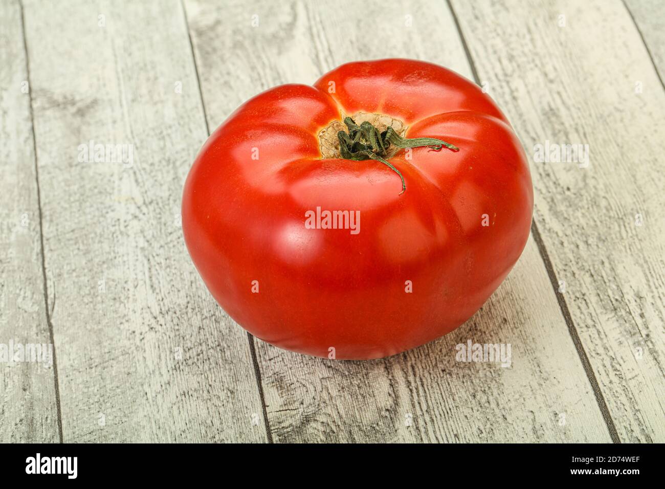 Ripe big juicy red tomato for cooking Stock Photo - Alamy
