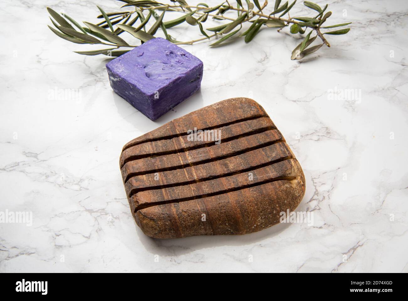 soap bar stand stone crafted Stock Photo - Alamy