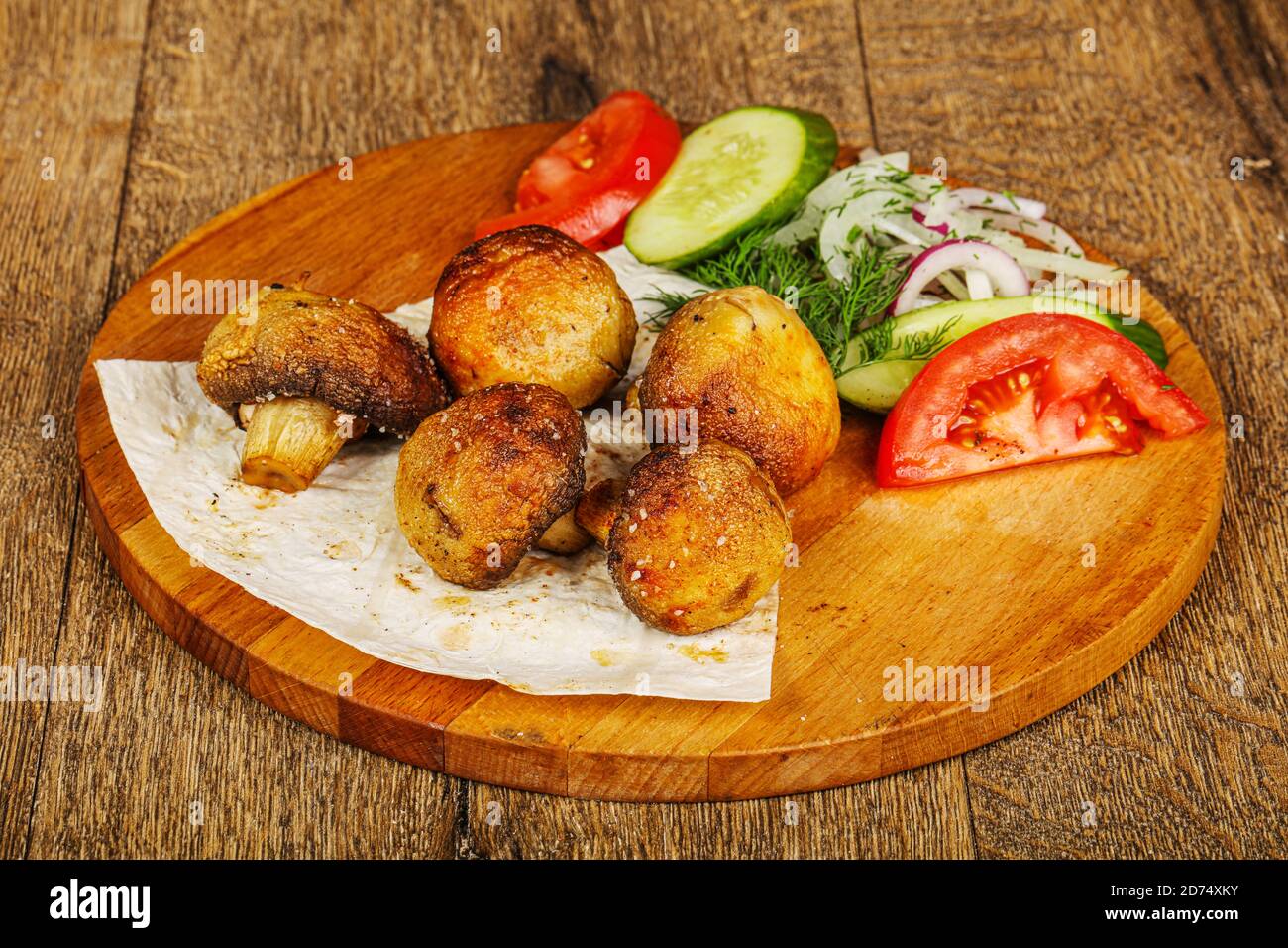 Grilled champignon with fresh vegetables and onion Stock Photo - Alamy