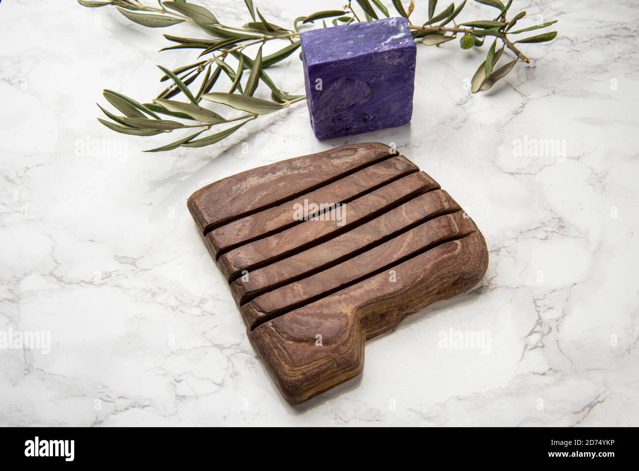 soap bar stand stone crafted Stock Photo - Alamy