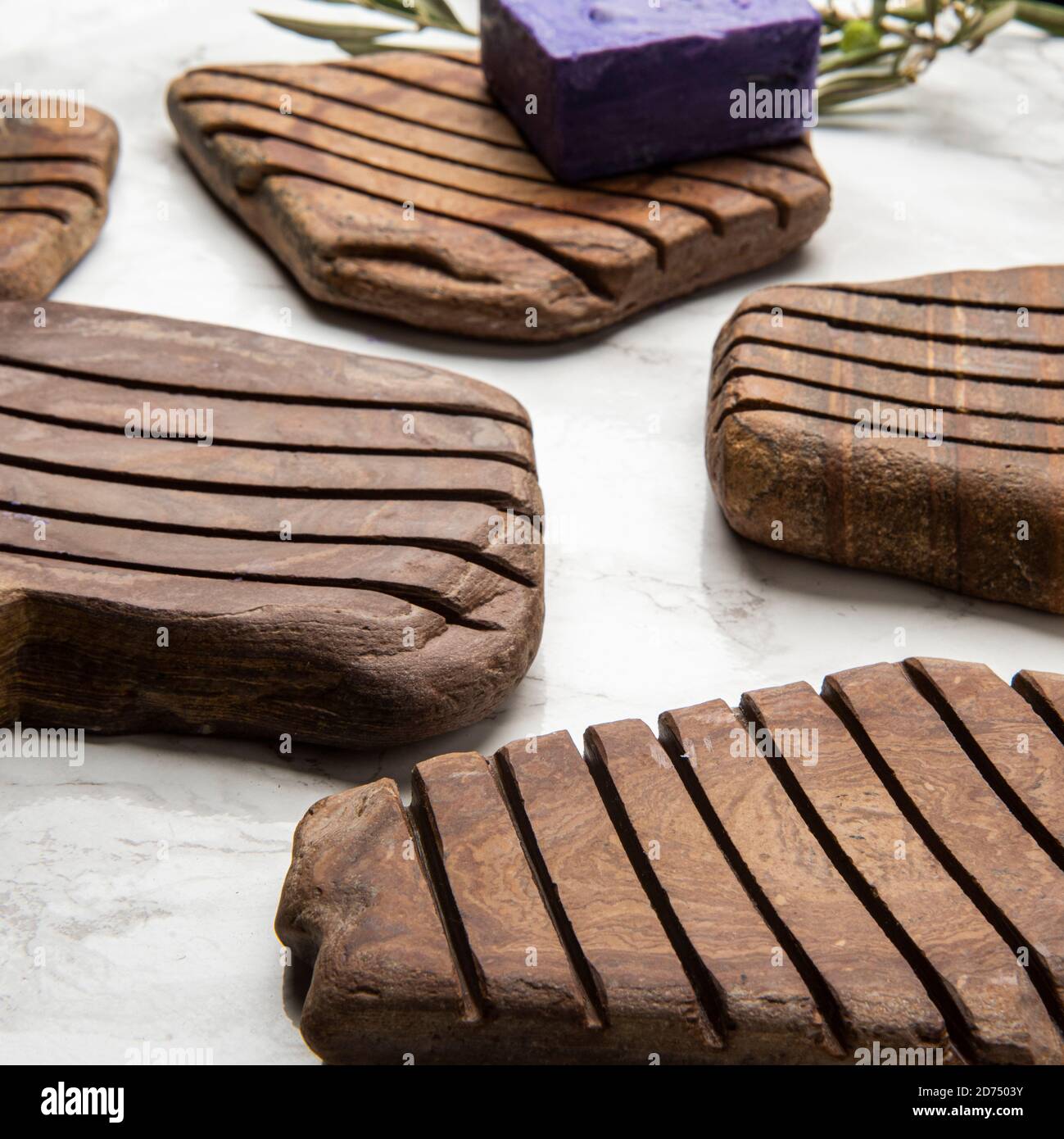 soap bar stand stone crafted Stock Photo - Alamy