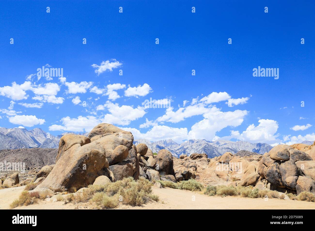Some unique rock formations at Alabama Hills with Sierra Nevada in the ...