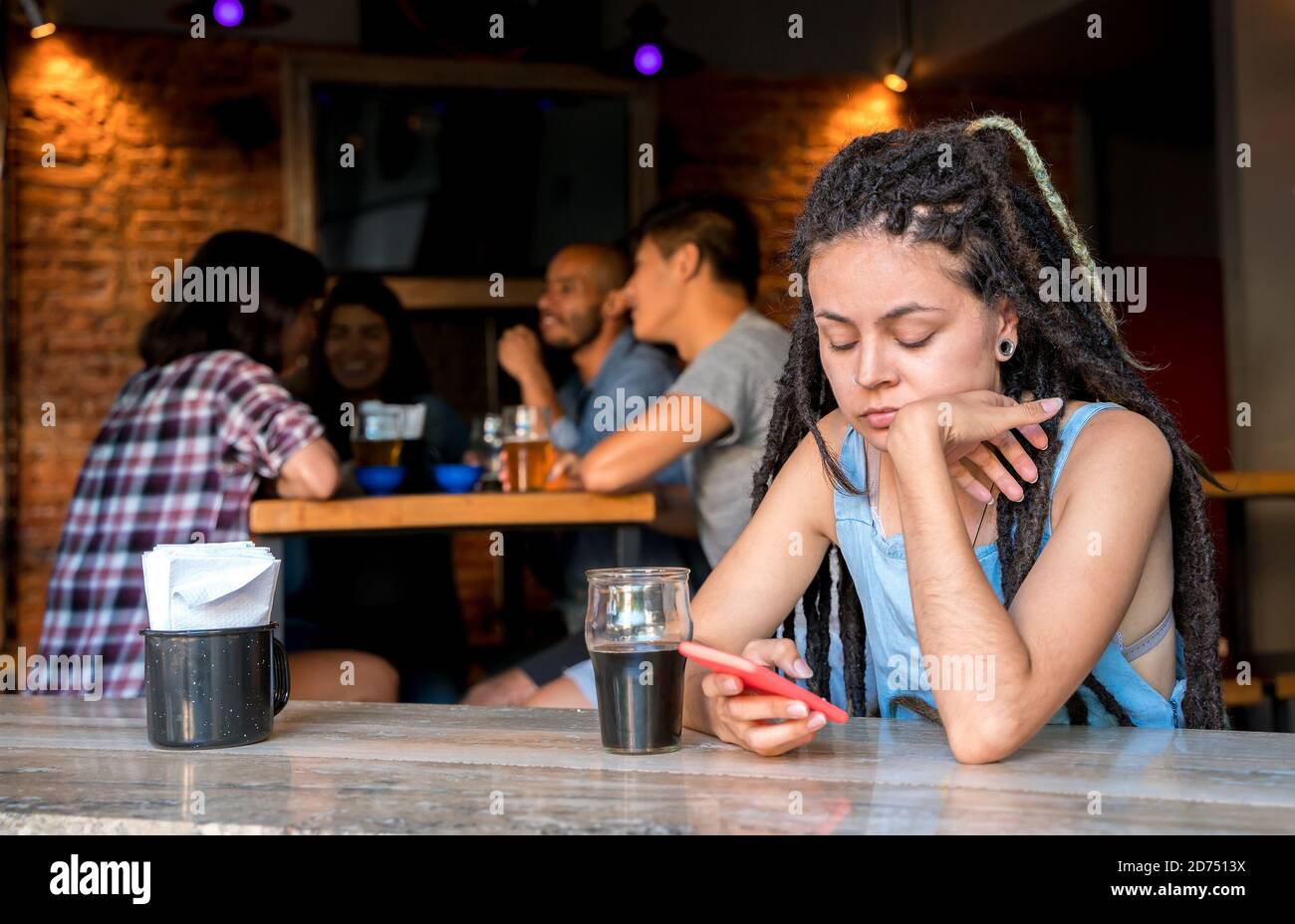 Lonely girl bar hi-res stock photography and images - Alamy