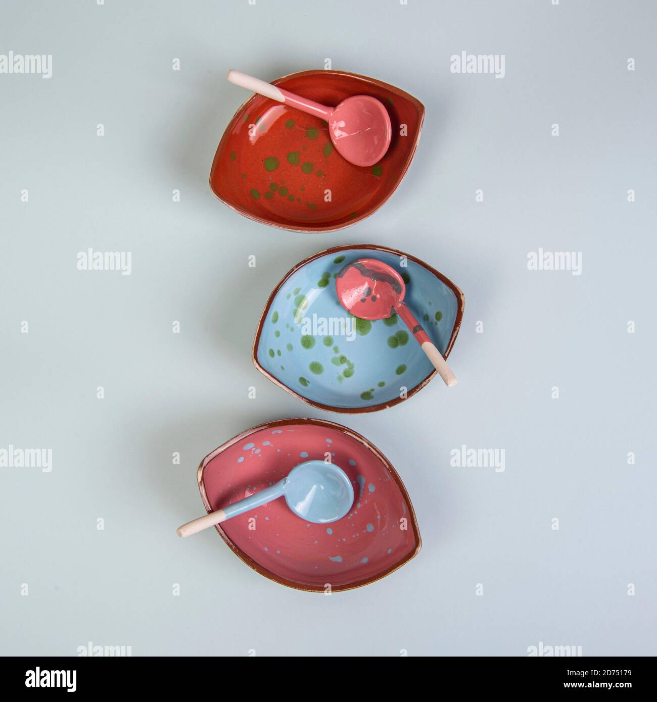 colorful handmade ceramic bowls isolated Stock Photo - Alamy