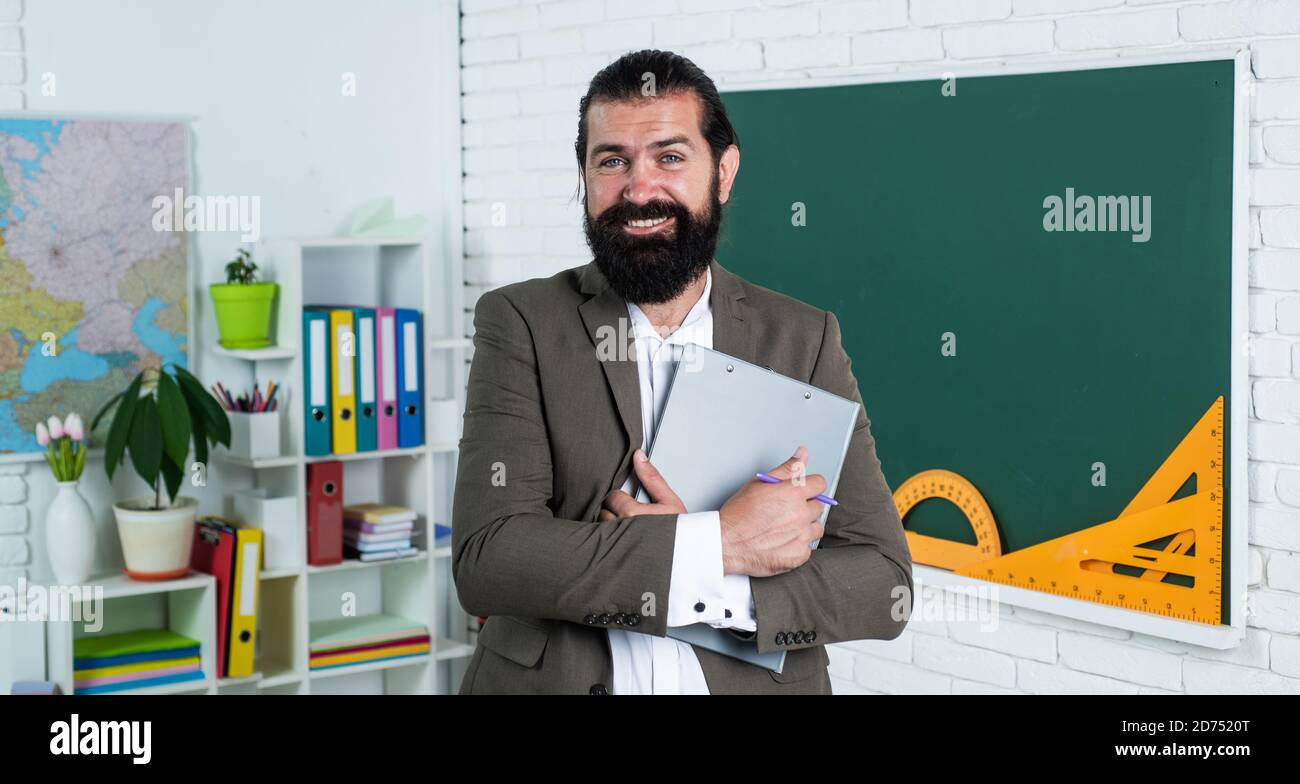 Going back to class. happy man with beard holding notebook. workbook ...