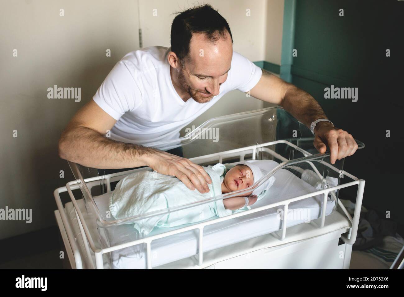 Father with her newborn baby at the hospital a day after birth Stock ...