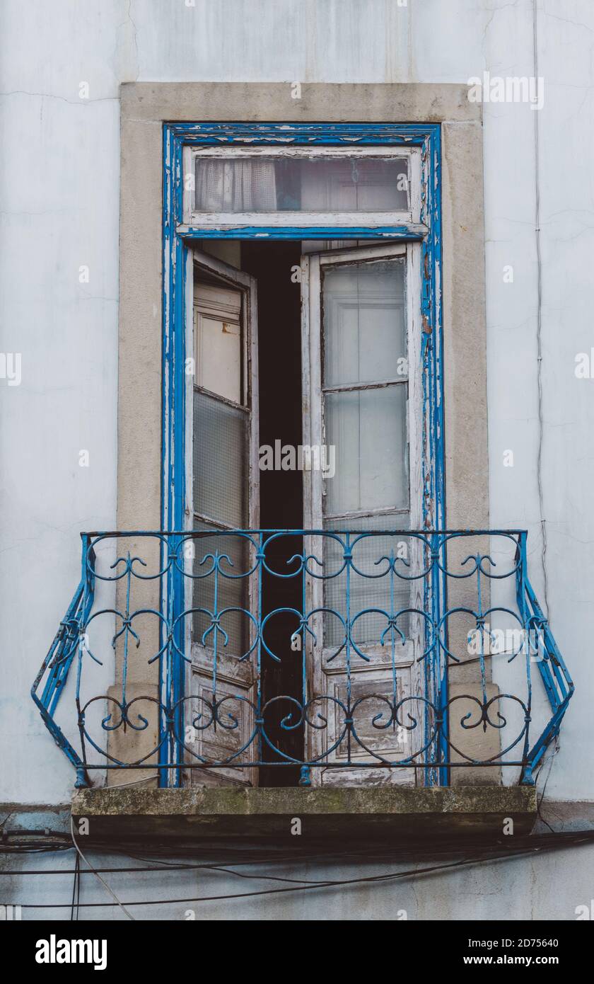 Vertical shot of an old house balcony Stock Photo - Alamy