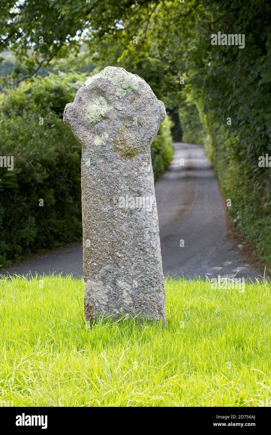Ancient stone cross at a road junction near Bodmin, Cornwall, England ...
