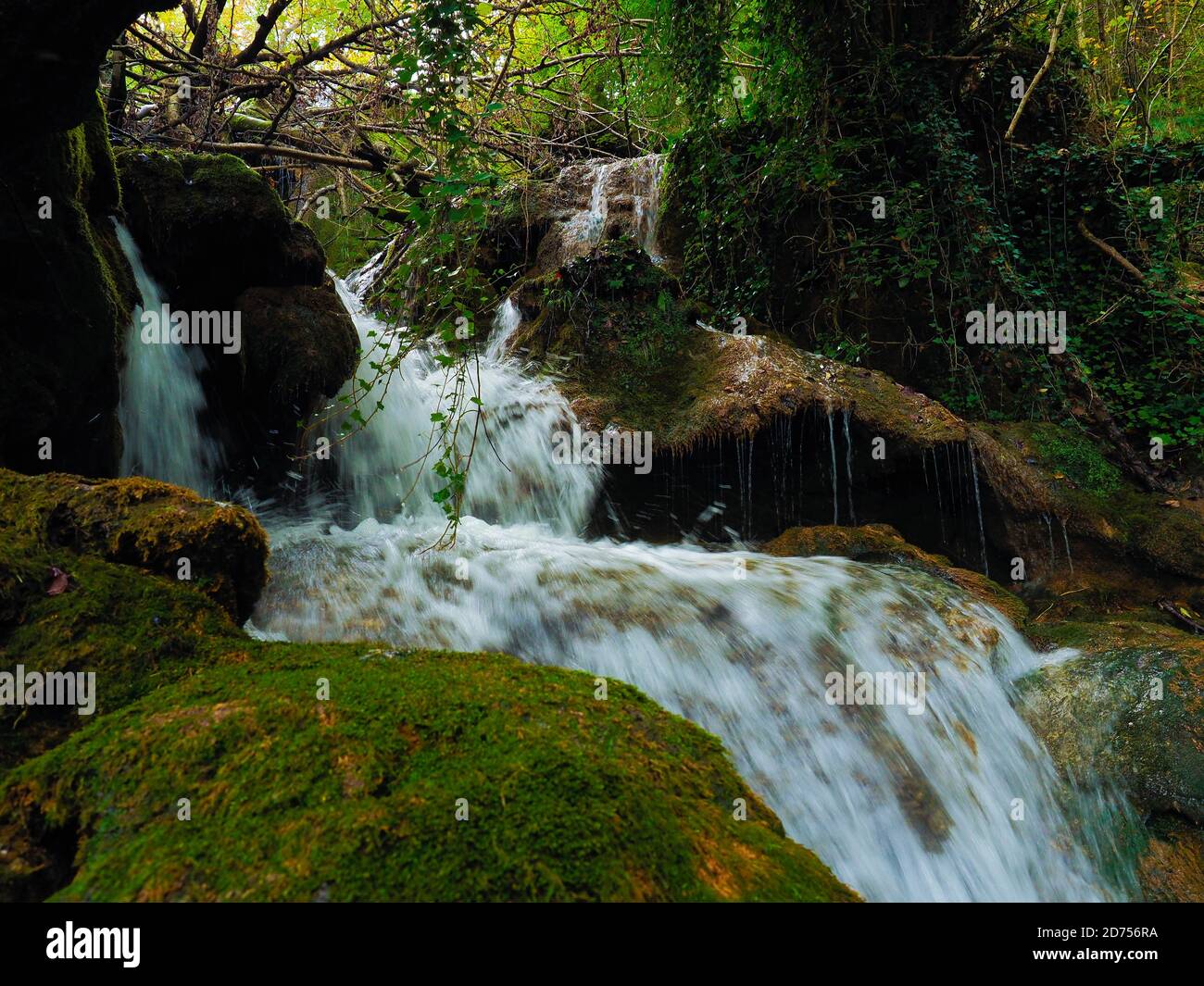 Waterfall in the forest of Andoin Stock Photo - Alamy