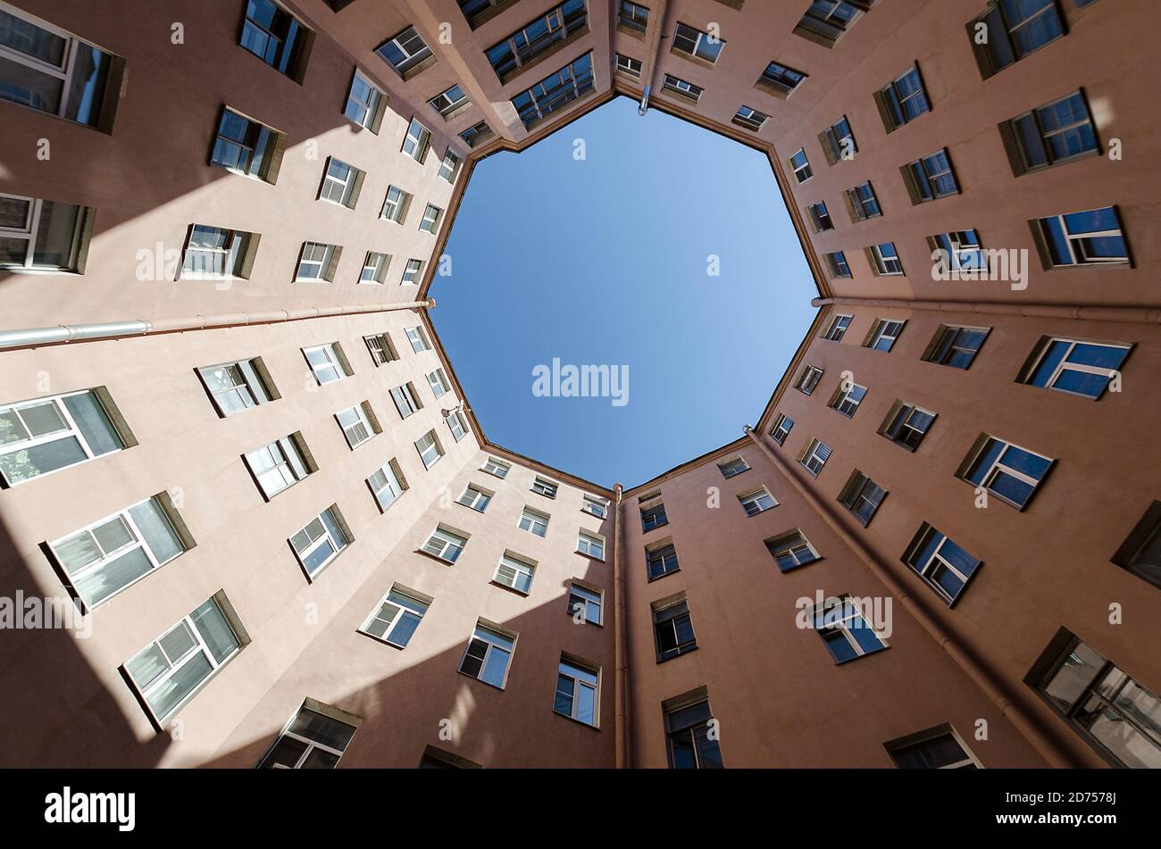 Octagon shape house courtyard. Bottom view octagon building in Saint ...