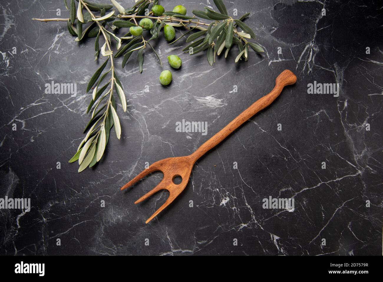 hand crafted wooden fork in the kitchen Stock Photo - Alamy