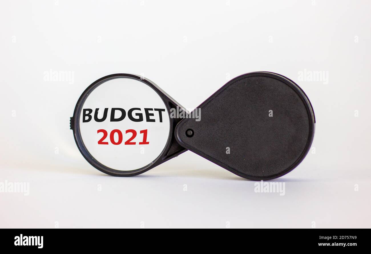 Magnifying glass with text 'budget 2021' on beautiful white background ...