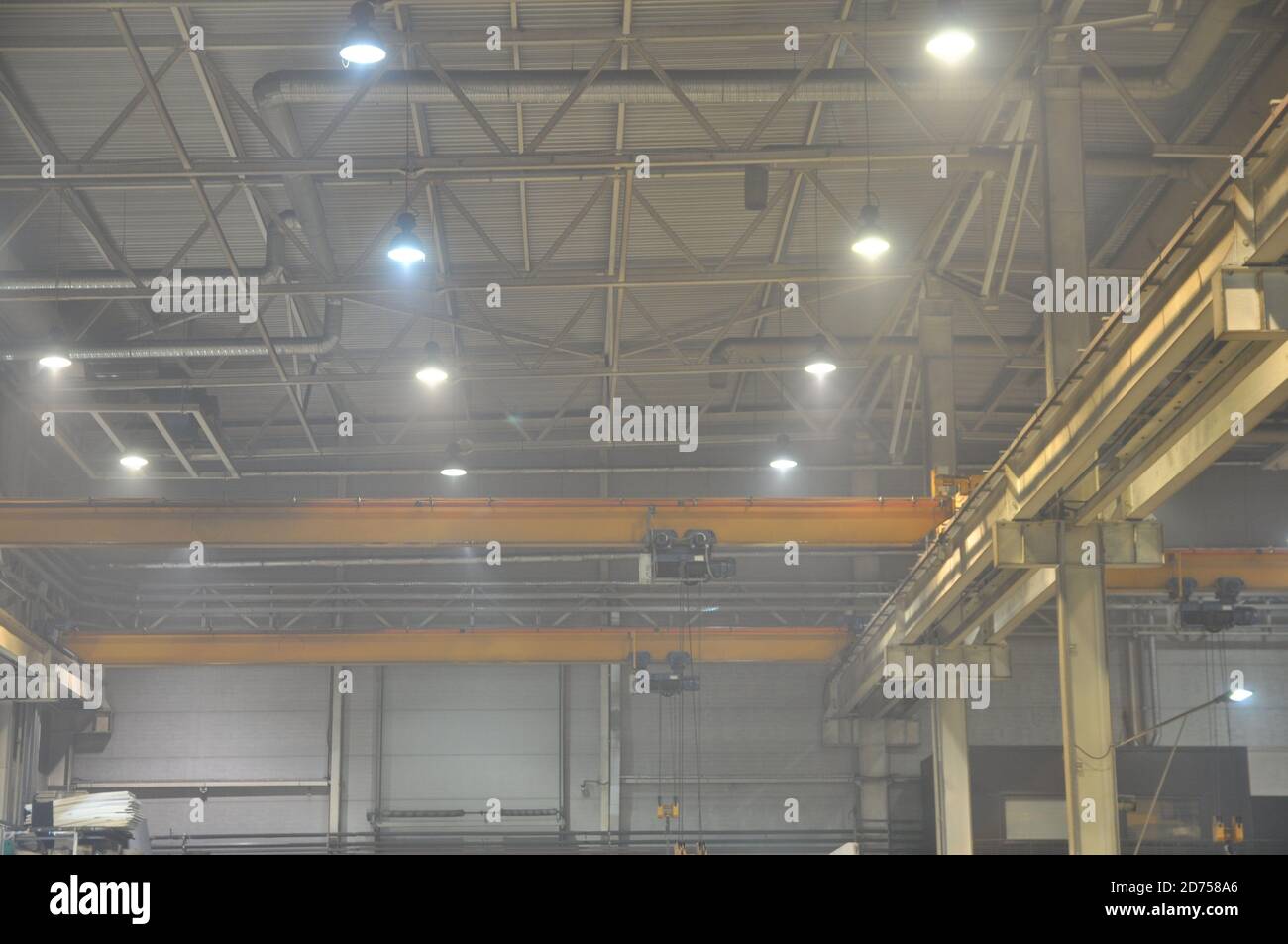 General view of a production facility with a high concentration of dust ...