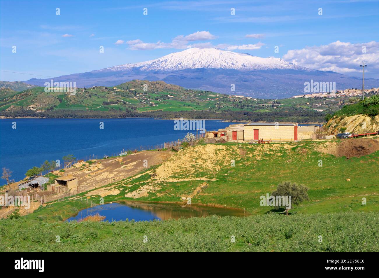 farm landscape of Sicily countryside around Etna Volcano snow covered ...