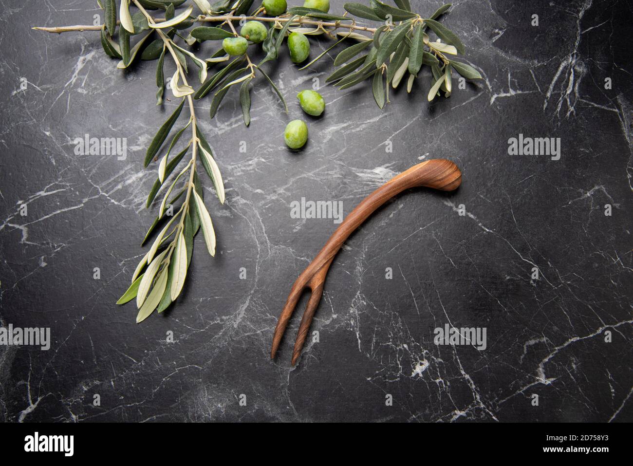 hand crafted wooden fork in the kitchen Stock Photo - Alamy