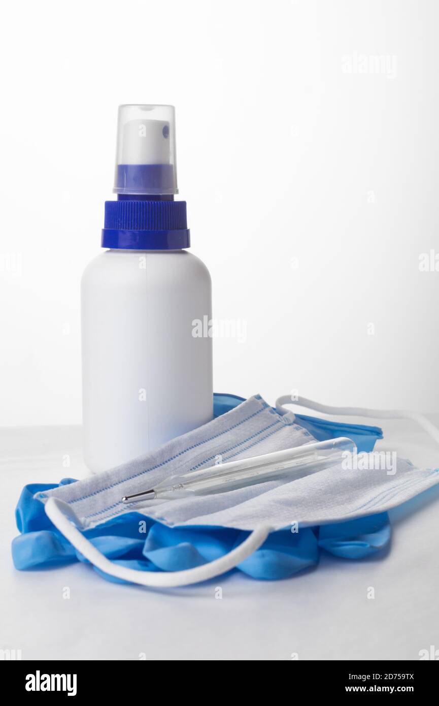 Individual protection means. Gloves, protectiv mask, thermometer and ...
