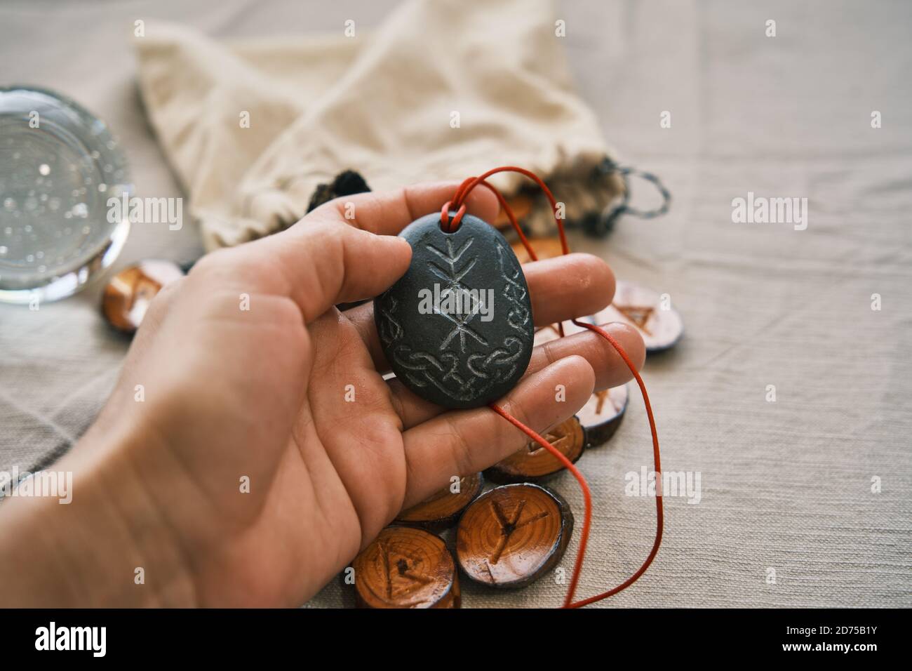 rune stone good luck and riches talisman with runescript Stock Photo ...