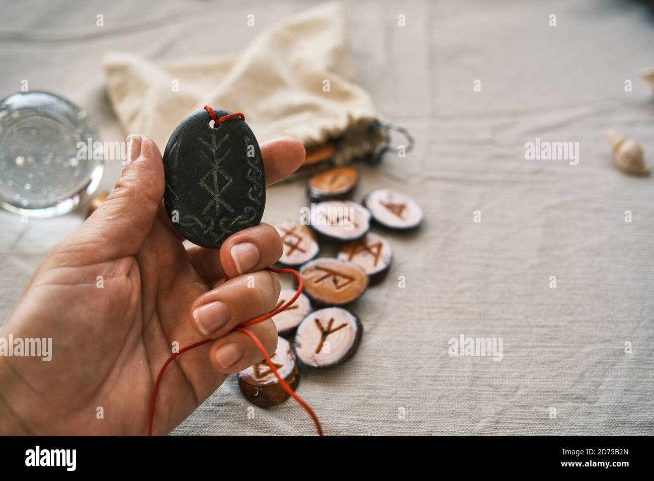 rune stone good luck and riches talisman with runescript Stock Photo ...