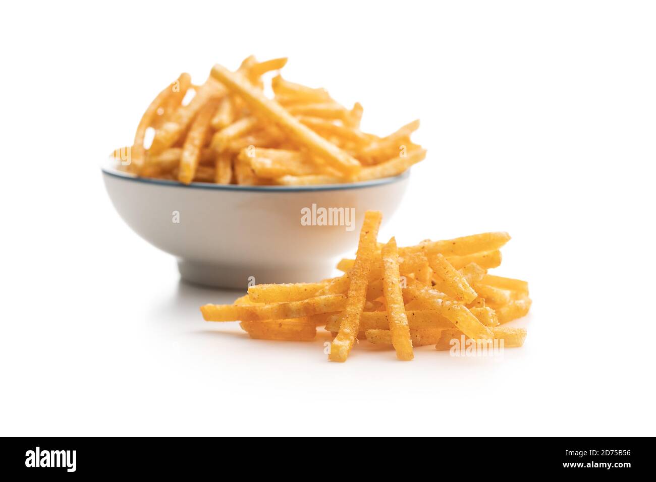 French fries. Fried mini potato sticks isolated on white background ...