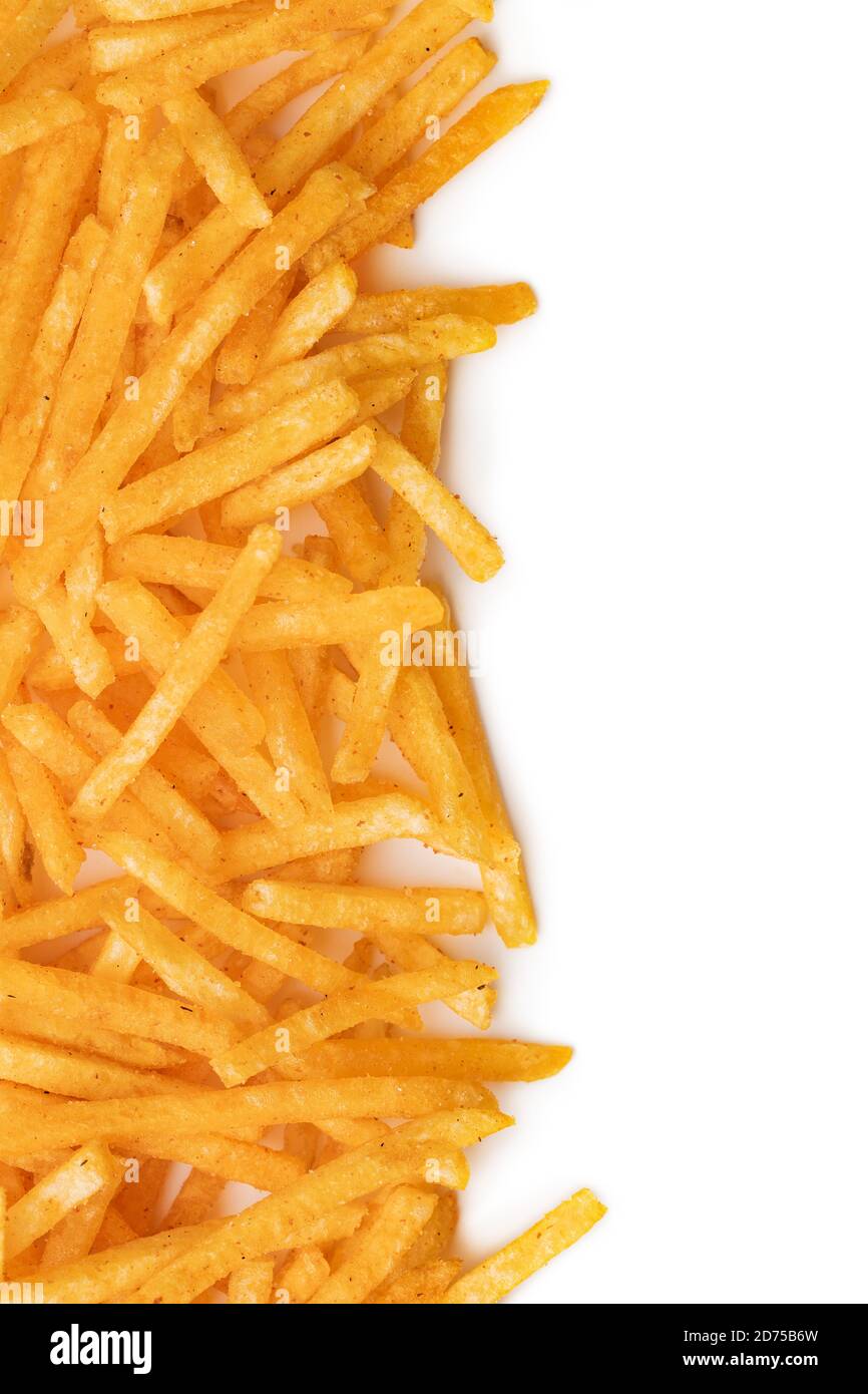 French fries. Fried mini potato sticks isolated on white background ...