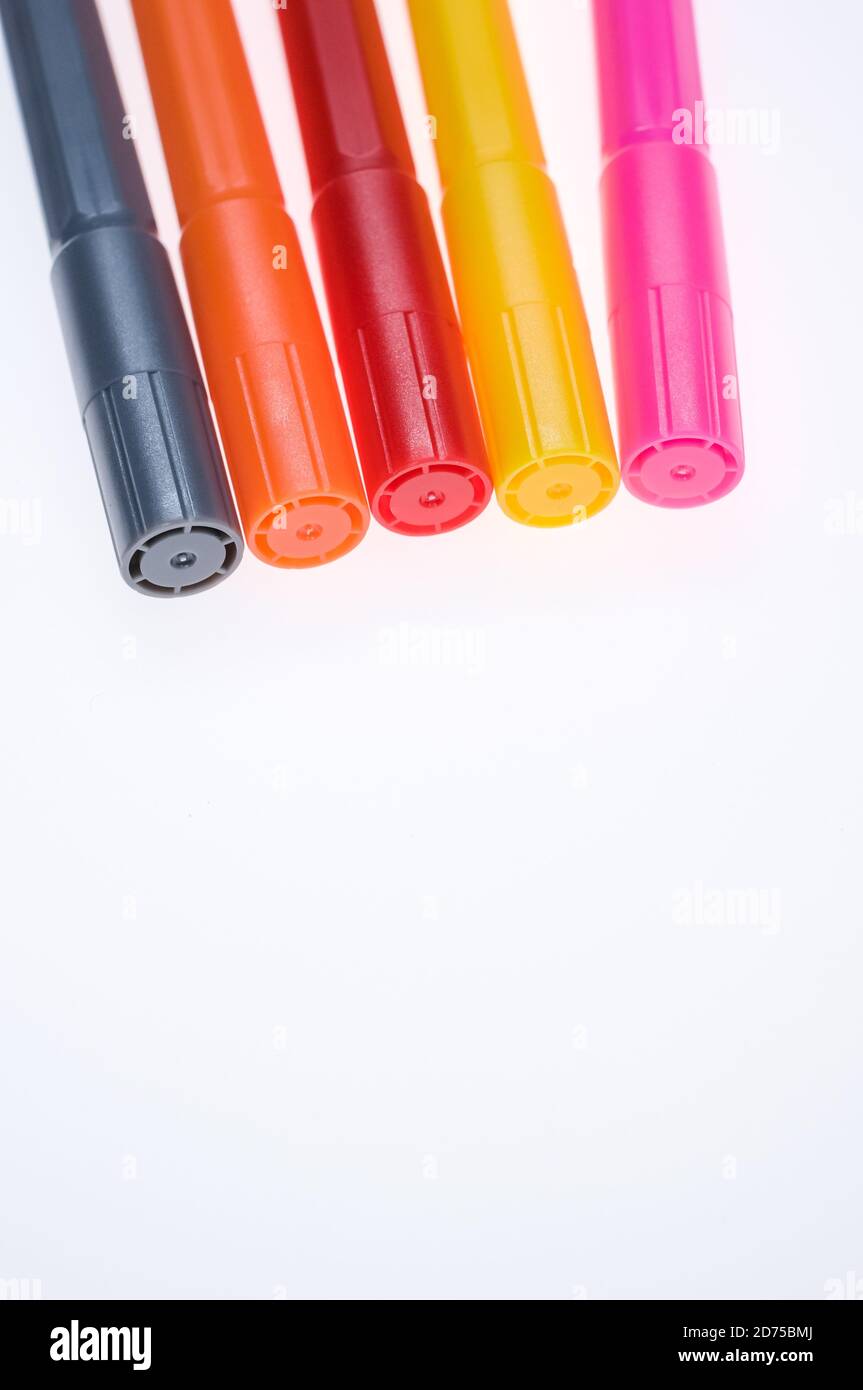 Closeup of five different color markers placed next to each other ...