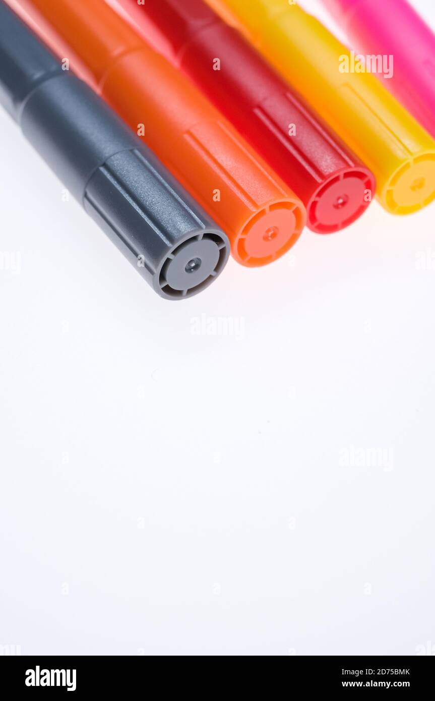 Closeup of five different color markers placed next to each other ...