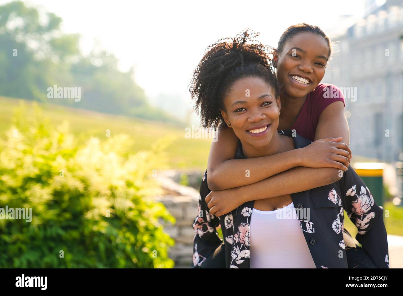 Latin American Mother with her Daughter together Stock Photo - Alamy